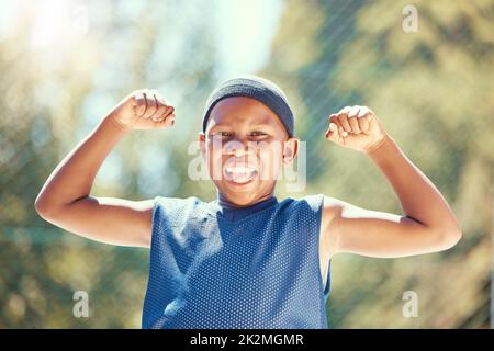 Sport children. Child with strong biceps muscles. Sport exercise for kids. Sporty children ...