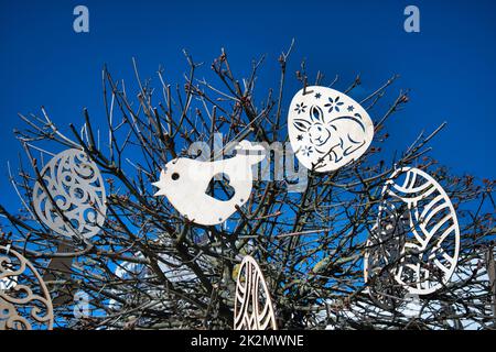 Colorful Easter decorations hanging on tree branches Stock Photo - Alamy