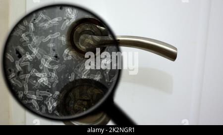 Searching for bacteria on door knob Stock Photo - Alamy