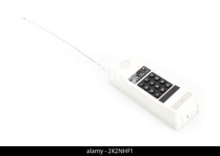 eighties old cordless home telephone with his antenna extended in a ...