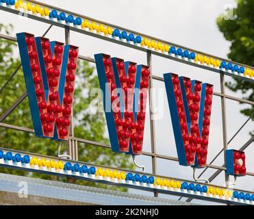 electric CIRCUS sign on a scaffolding in the night Stock Photo - Alamy