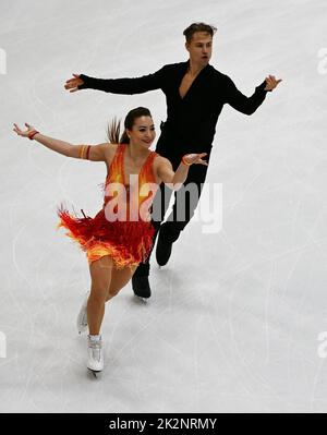 Allison Reed and Saulius Ambrulevicius from Lithuania compete in the ...