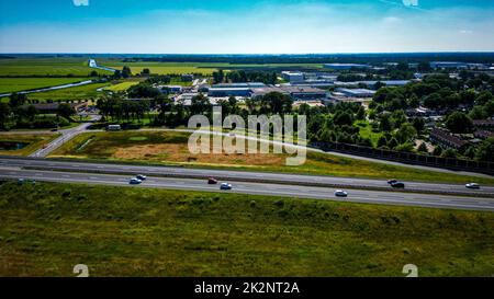 An aerial view of the traffic on A32 highway near Heerenveen town in ...