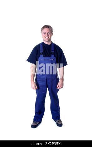 Portrait of a young craftsman, worker, fitter against white background ...