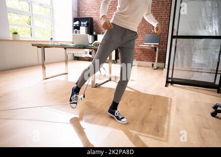 Stumble And Fall Over Wire Stock Photo - Alamy