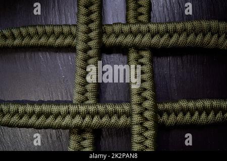 handmade woven paracord string bracelet Stock Photo - Alamy