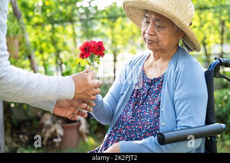 this red rose in my garden is not mature yet but it smells very well ...