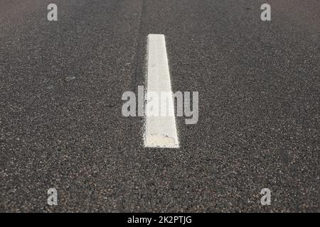 Asphalt road with single solid white line road marking Stock Photo - Alamy