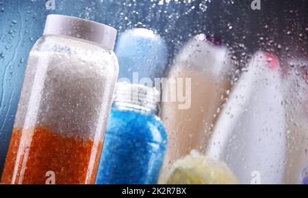Different containers of body care products in the bathroom Stock Photo ...