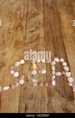 the word sea written with shells Stock Photo - Alamy