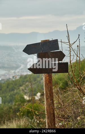 Hiking sign. Road sign board on the mountain. Adventure outdoor. Peak ...