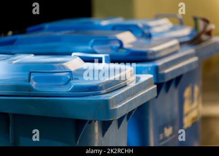 Garbage cans in closeup Stock Photo - Alamy