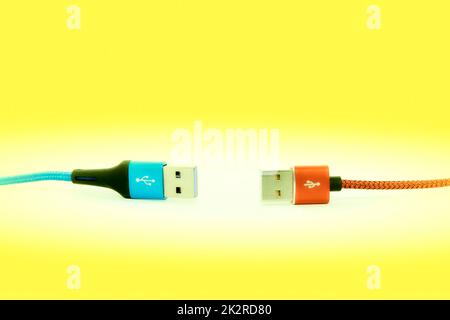 Blue red Universal Serial Bus cables isolated on a gray background ...