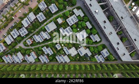 A bird's eye view of a lovely neighborhood with lush green trees ...