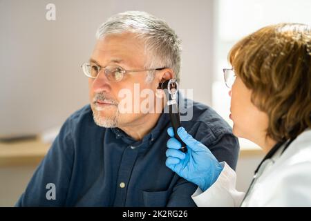 Otolaryngology Ear Check Using Otoscope Stock Photo - Alamy
