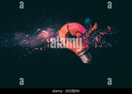 breaking of a red bulb on a black background Stock Photo - Alamy
