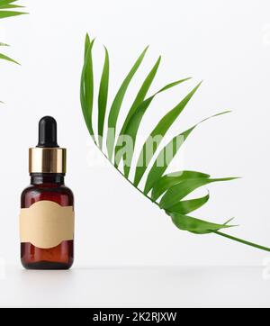 Cosmetics container set on wooden desk and grey beige natural ...