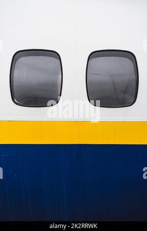 Airplane windows from the outside Stock Photo - Alamy