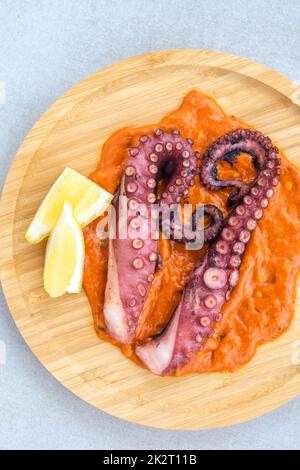 Roasted octopus tentacles with chilli romesco sauce Stock Photo - Alamy