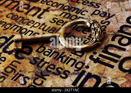 Golden key on banking stress Stock Photo - Alamy