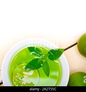 mint infusion tea tisane with lime Stock Photo - Alamy