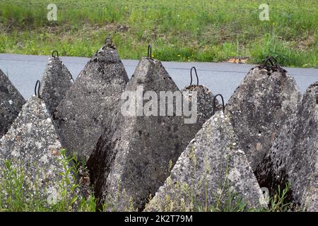 Reinforced concrete anti-tank barrier Stock Photo - Alamy
