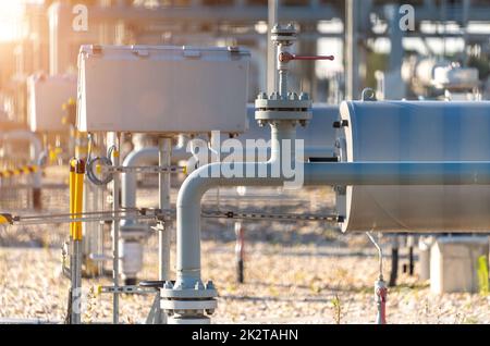 over land gas pipeline system at natural gas station Stock Photo - Alamy