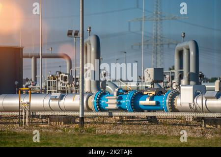 over land gas pipeline system at natural gas station Stock Photo - Alamy
