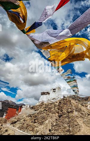 Leh gompa and lungta prayer flags, Ladakh Stock Photo - Alamy