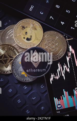 Various Cryptocurrencies with candle stick graph chart and digital ...