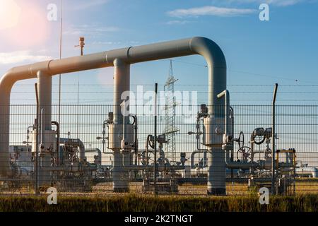over land gas pipeline system at natural gas station Stock Photo - Alamy