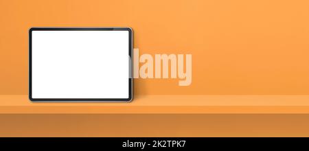 Digital tablet pc on orange wall shelf. Vertical background banner ...