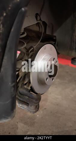 Installing a new car brake disc Stock Photo - Alamy