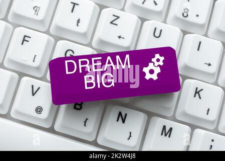 Sign displaying Dream Big. Word Written on To think of something high ...