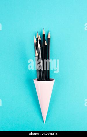 Black Cone on a blue background. Conus Marmoreus. Shell With White ...