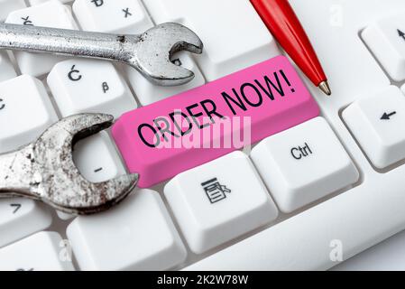 Text sign showing Order Now. Business photo showcasing the activity of ...