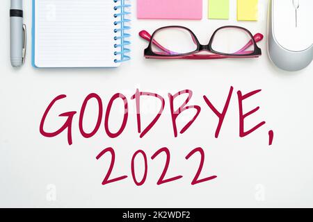 Hand writing sign Goodbye 2022. Business approach New Year Eve ...