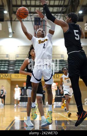 A vertical of African Americans playing basketball at Bosco vs United ...