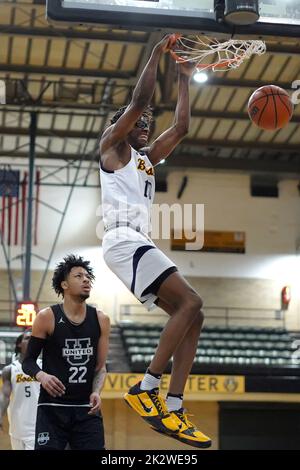 A vertical of African Americans playing basketball at Bosco vs United ...