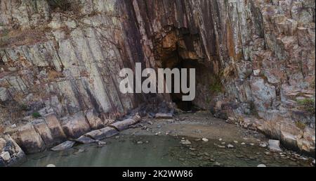 Sea cave with koi fish in Hong Kong Geopark Stock Photo - Alamy
