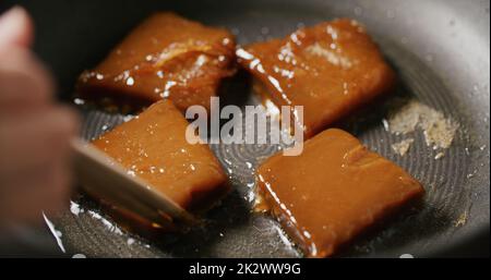 Grill chinese sticky rice cake Stock Photo - Alamy