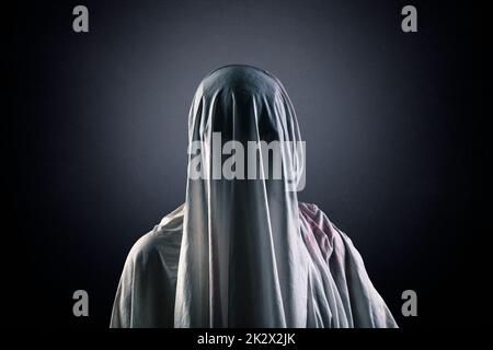 Portrait of a scary ghost over dark misty background Stock Photo - Alamy