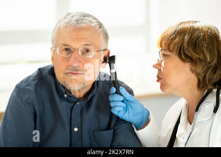 Otolaryngology Ear Check Using Otoscope Stock Photo - Alamy