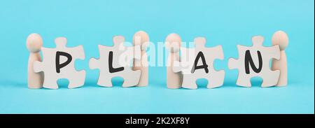 Puzzle pieces with word Plan Stock Photo - Alamy