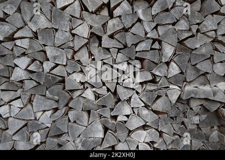 A dry firewood is evenly stacked in the woodpile Stock Photo - Alamy
