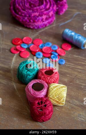 Different sewing threads on coils as background Stock Photo - Alamy