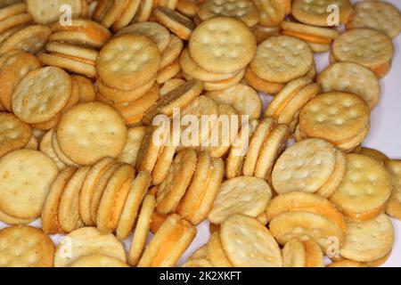 Pile of Mini Cheese Snack Crackers Close up Stock Photo - Alamy