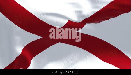 Close up of the Alabama state flag waving in the wind. Alabama is a ...