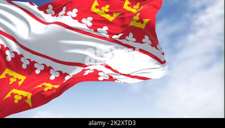 View of the Alsace flag waving in the wind on a clear day. Alsace is a ...