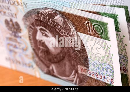 Polish money - 10 Zloty a background Stock Photo - Alamy